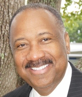 Charles DeShazer, MD (About) – The Leverage Network Inc.